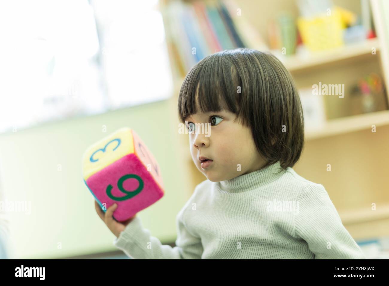 Boys learning in an early childhood classroom Stock Photo - Alamy