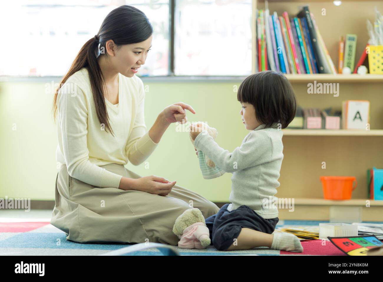 Boys learning in an early childhood classroom Stock Photo - Alamy