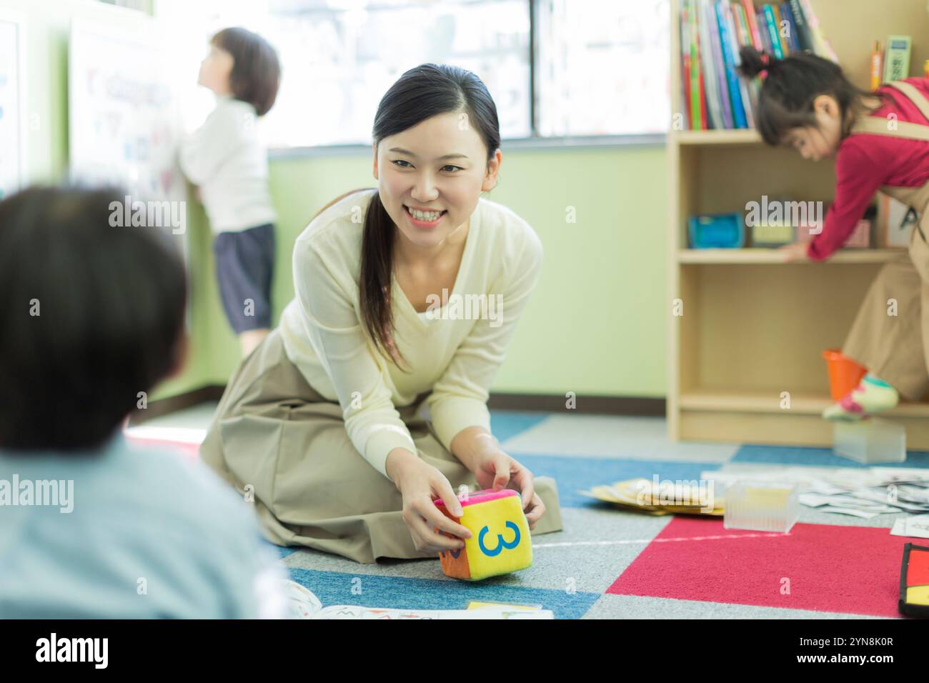 Teacher teaching a class in an early childhood classroom Stock Photo ...