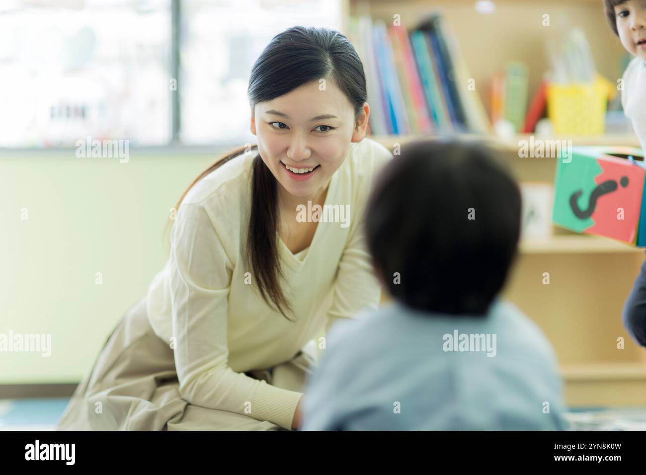 Teacher teaching a class in an early childhood classroom Stock Photo ...