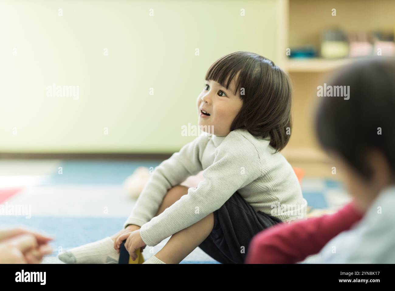 Boys learning in an early childhood classroom Stock Photo - Alamy