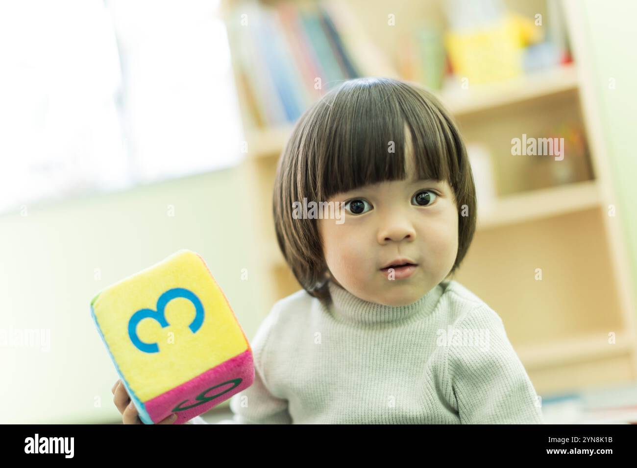 Boys learning in an early childhood classroom Stock Photo - Alamy