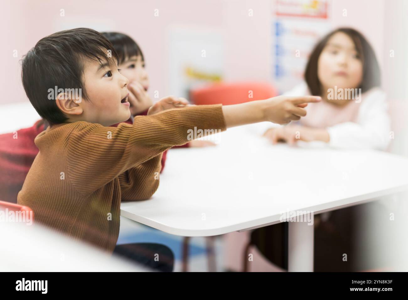 Children taking a class in a classroom Stock Photo - Alamy