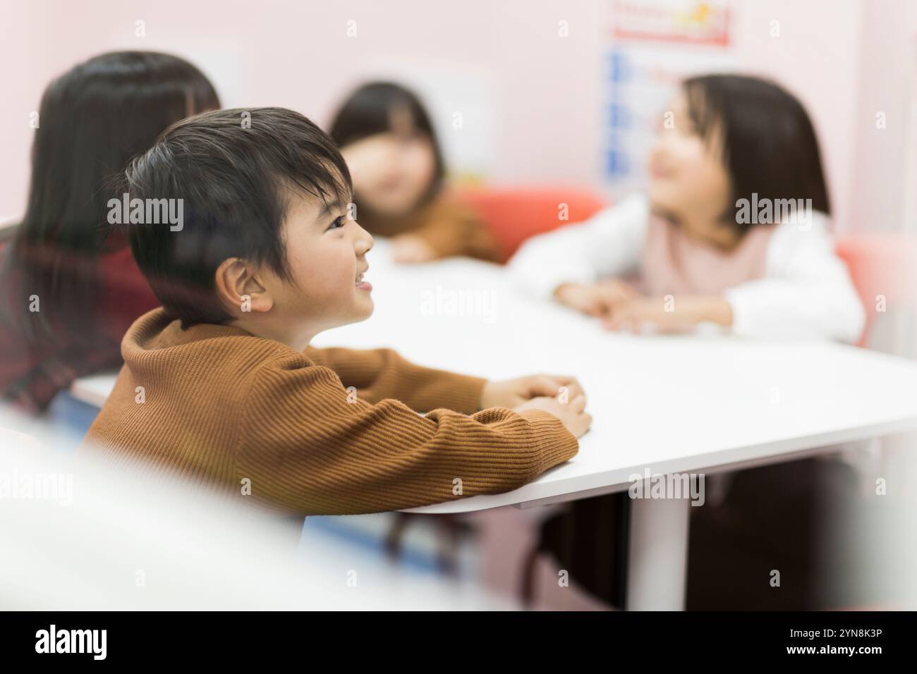 Children taking a class in a classroom Stock Photo - Alamy