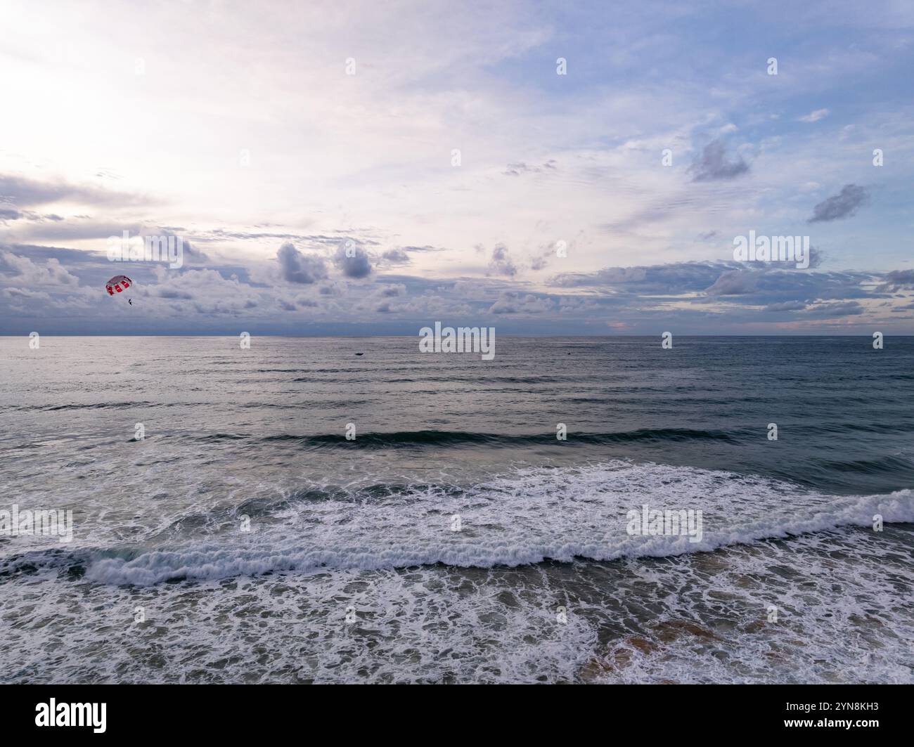 Aerial view of a blue sea surface water texture background and sun ...