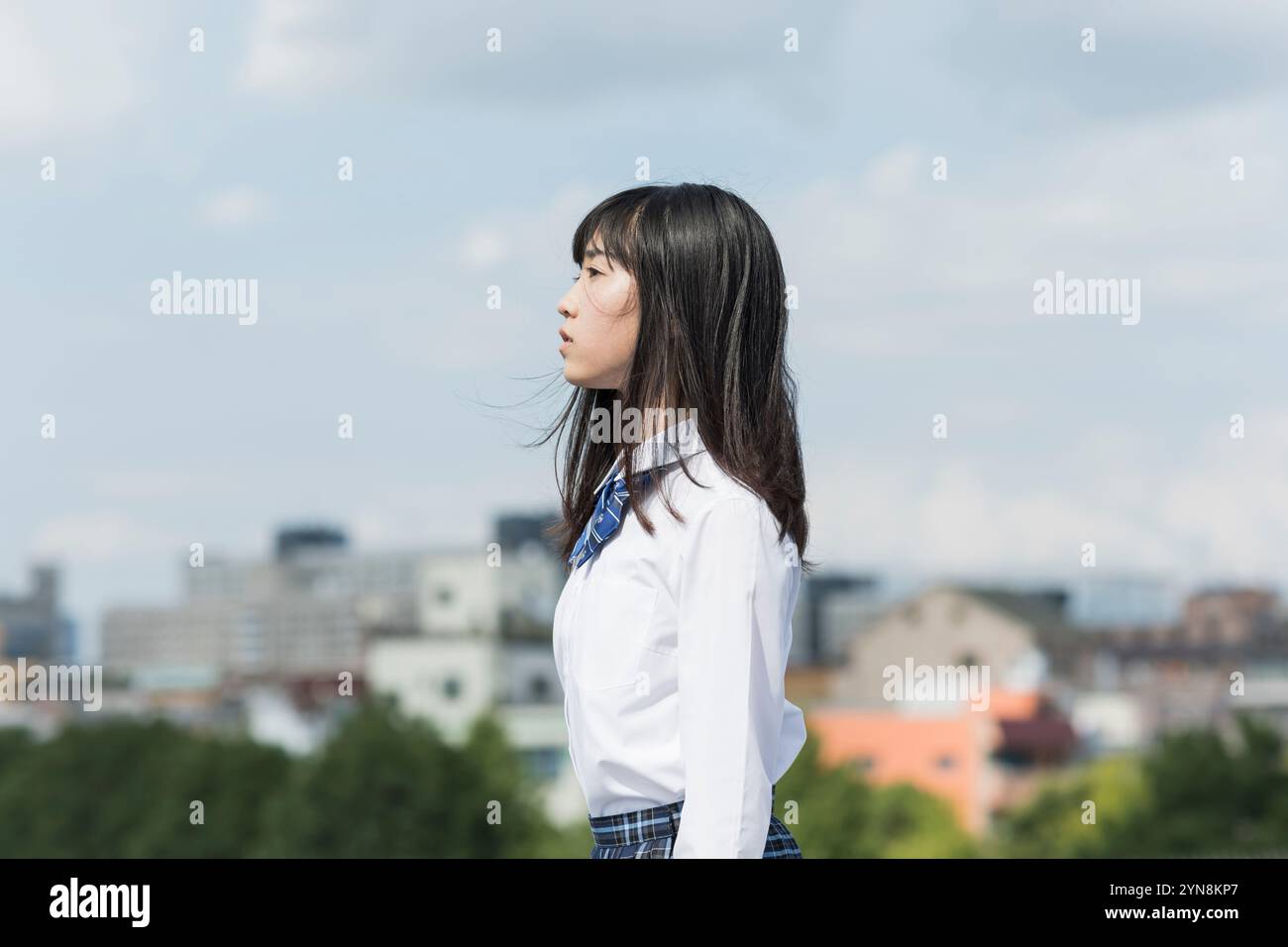 Female student gazing into the distance Stock Photo - Alamy