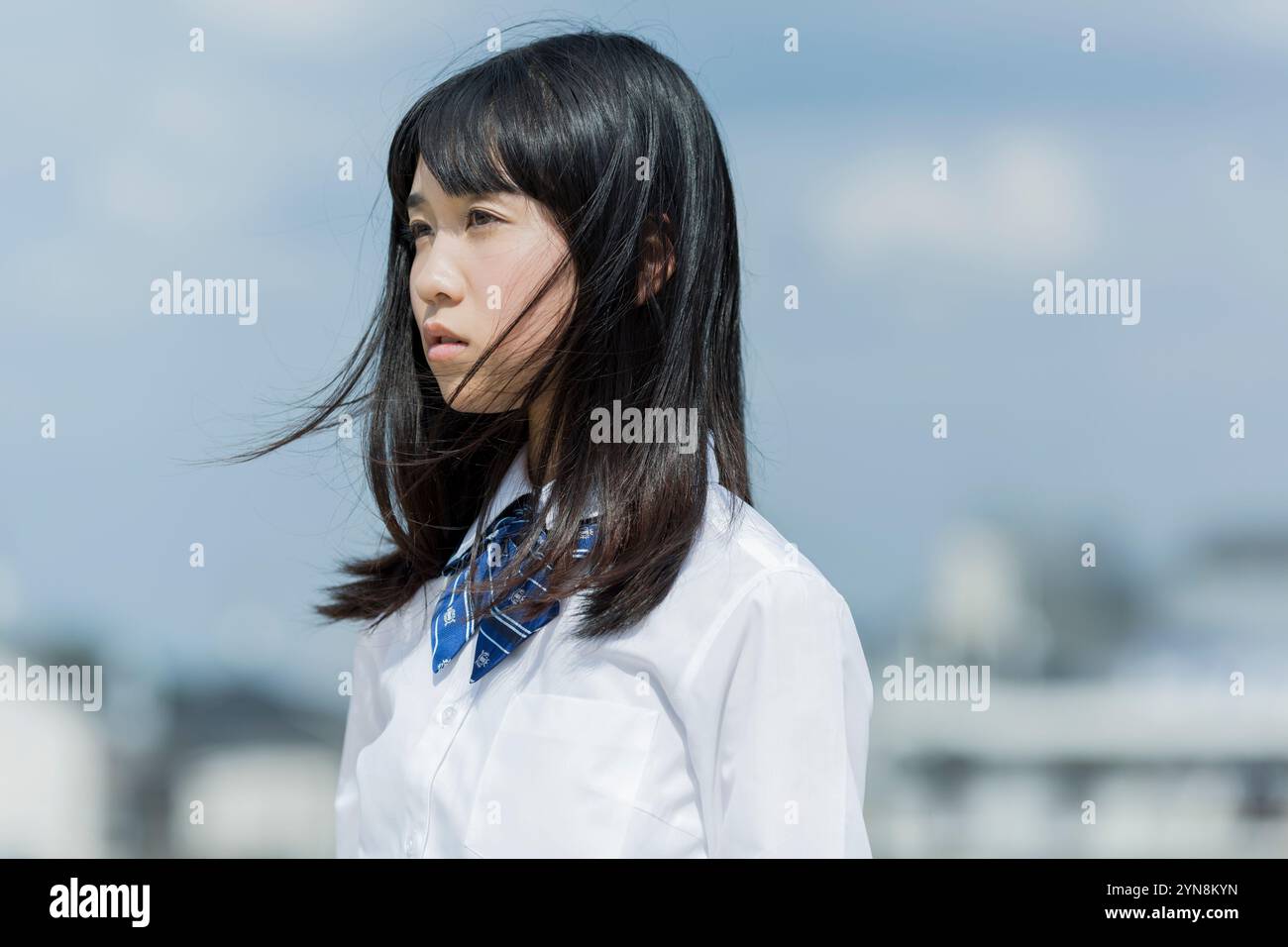 Female student gazing into the distance Stock Photo - Alamy