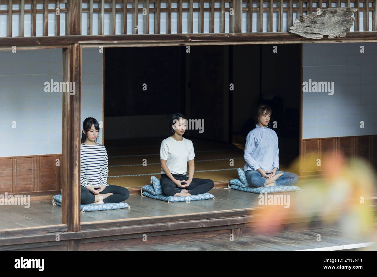Group three people doing meditation hi-res stock photography and images ...