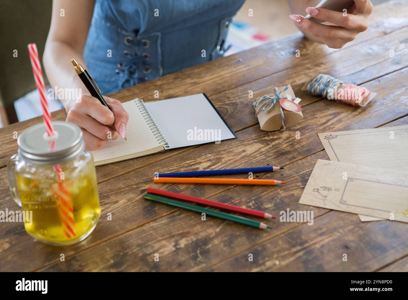 Hand taking a colored pencil hi-res stock photography and images - Alamy