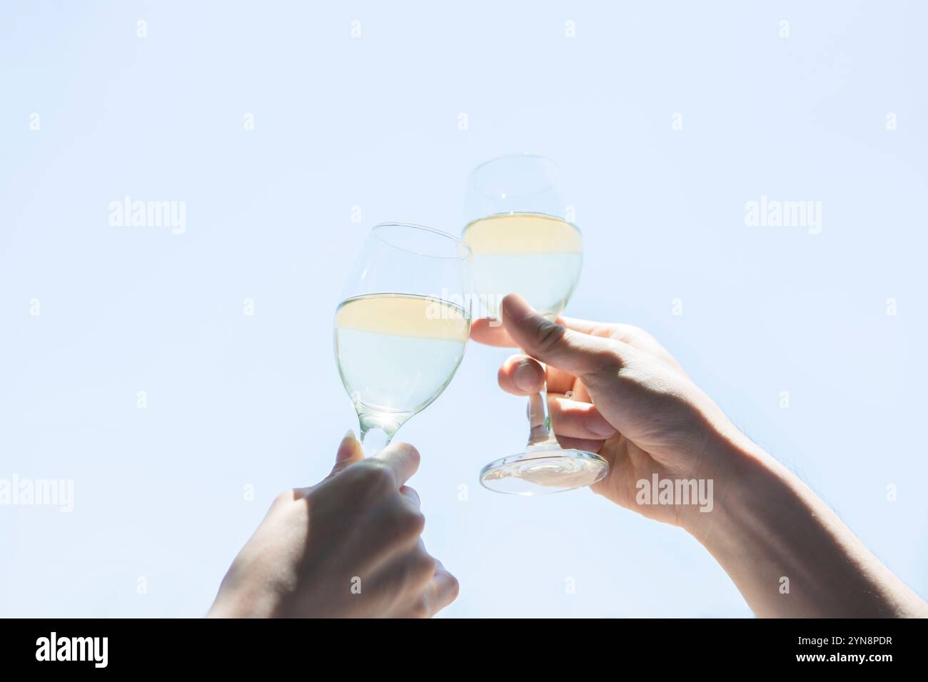 Wine toast glass hand hi-res stock photography and images - Alamy