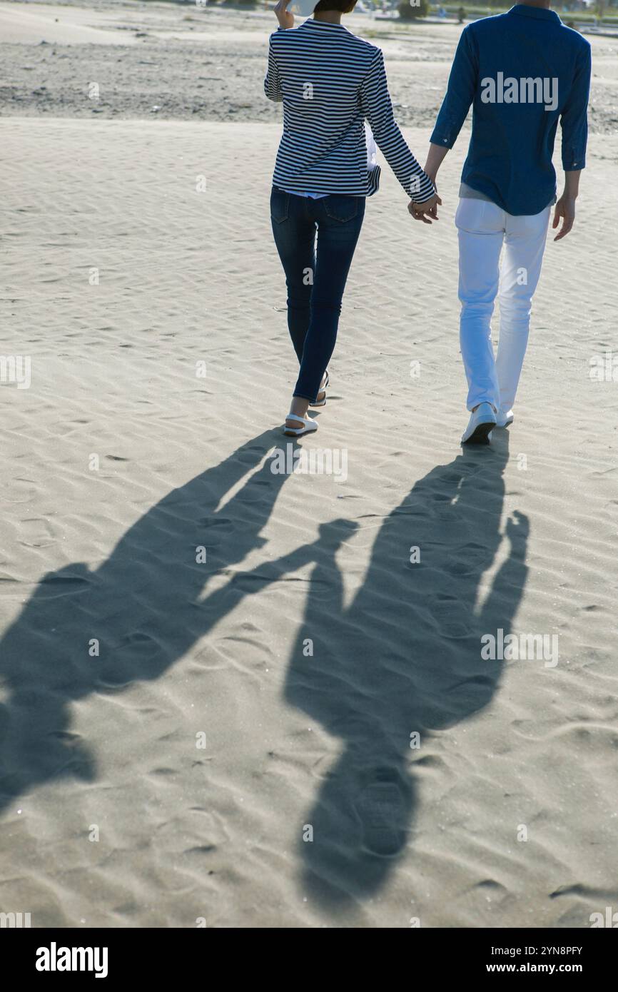 Human shadow on beach hi-res stock photography and images - Alamy