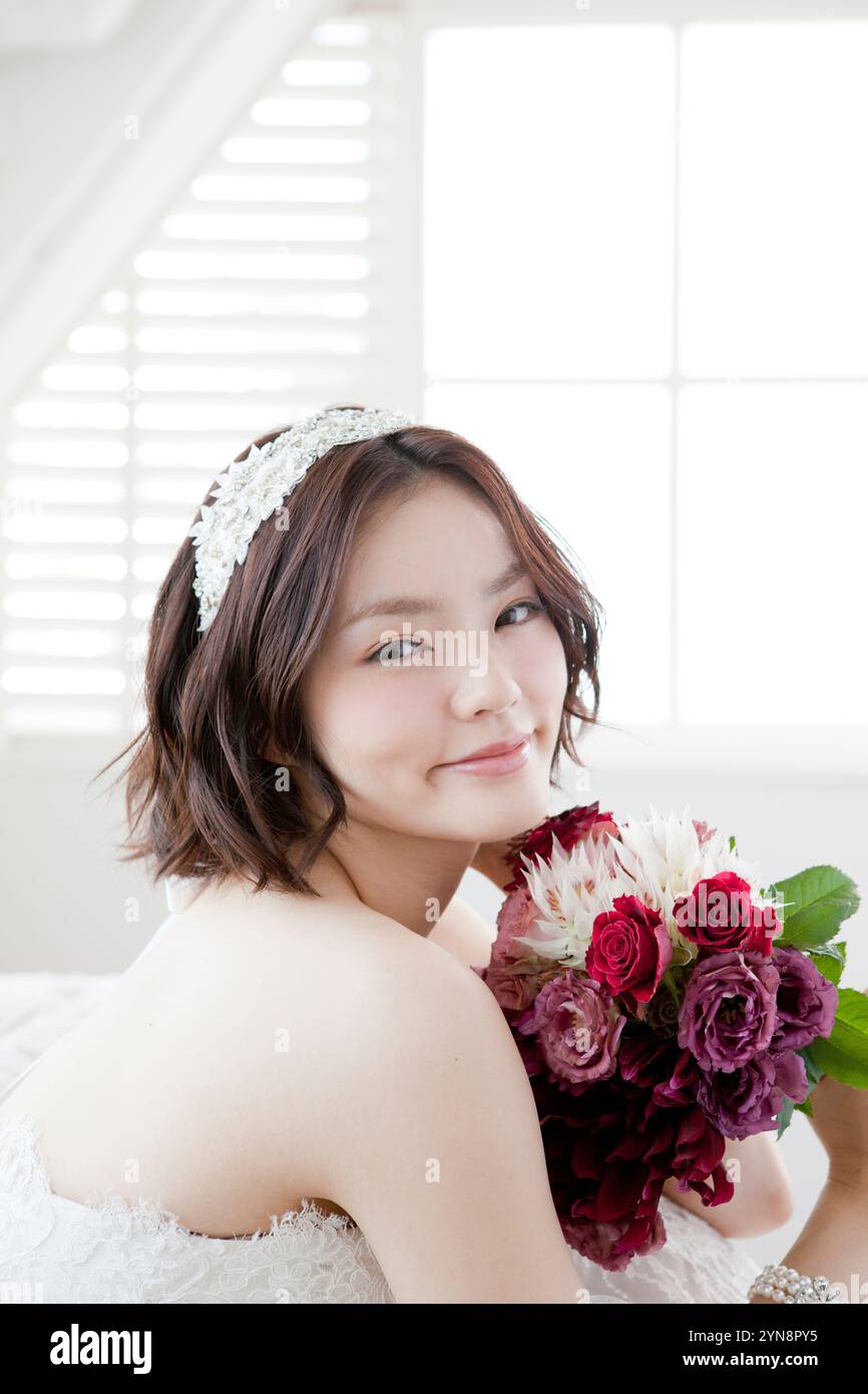 Dress with bouquet hi-res stock photography and images - Alamy