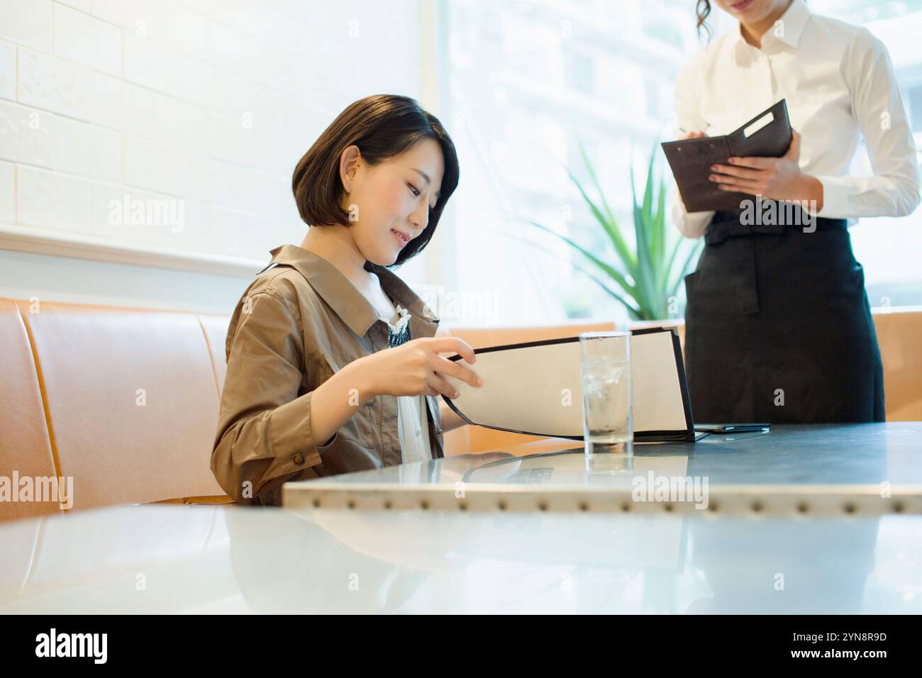 Woman ordering clothes hi-res stock photography and images - Alamy