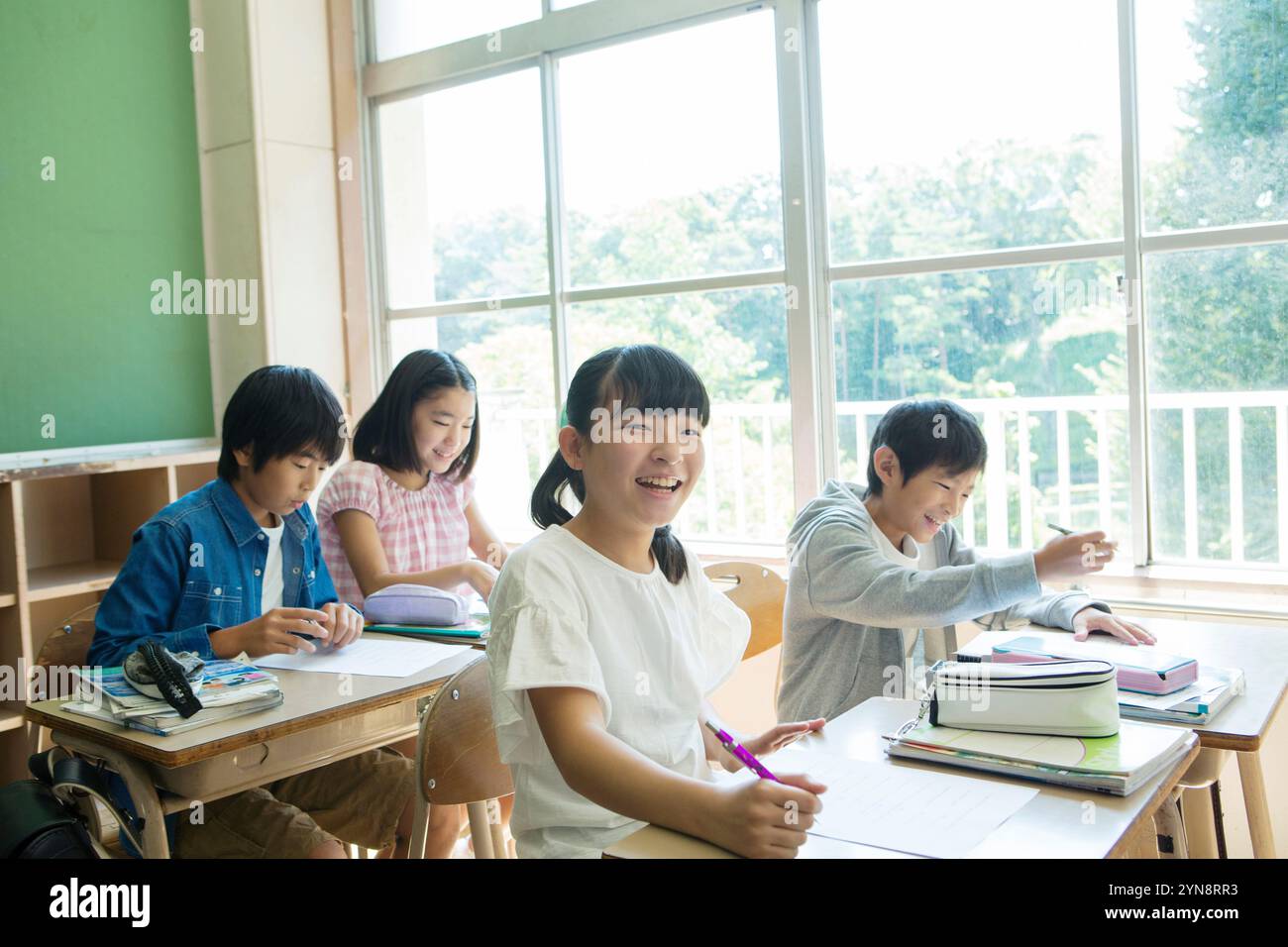 Primary school children in class Stock Photo - Alamy