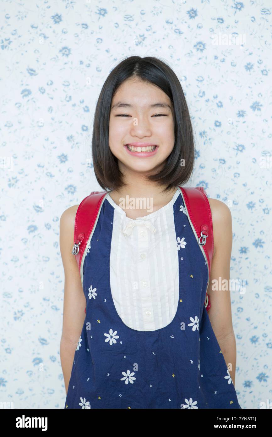 Smiling primary school girl portrait Stock Photo - Alamy