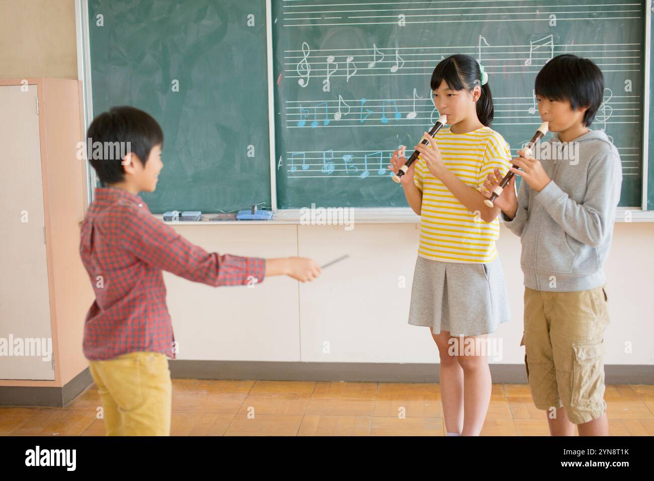 Primary school children in music class Stock Photo - Alamy