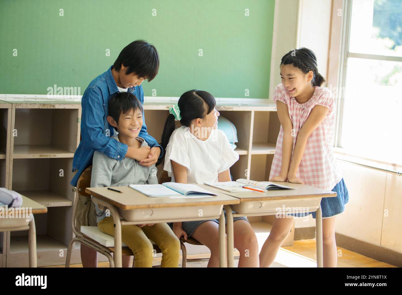 Chat in classroom senior hi-res stock photography and images - Alamy