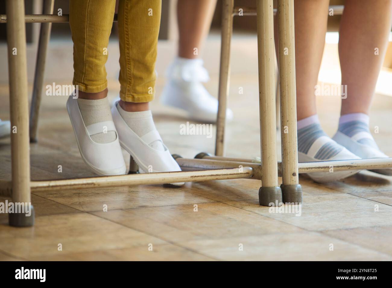 Primary school children in classrooms on their feet Stock Photo - Alamy