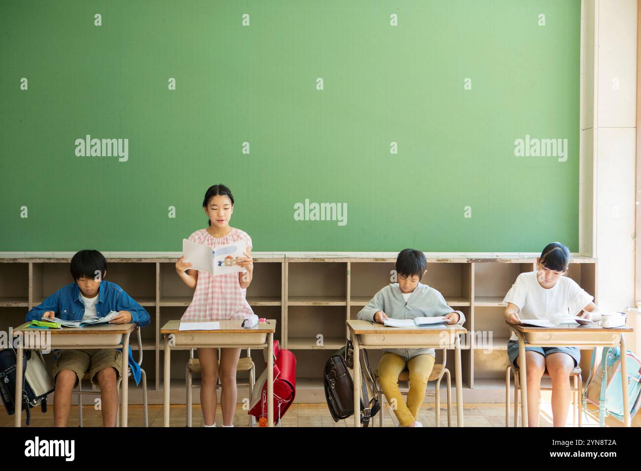 Primary school children in class Stock Photo - Alamy