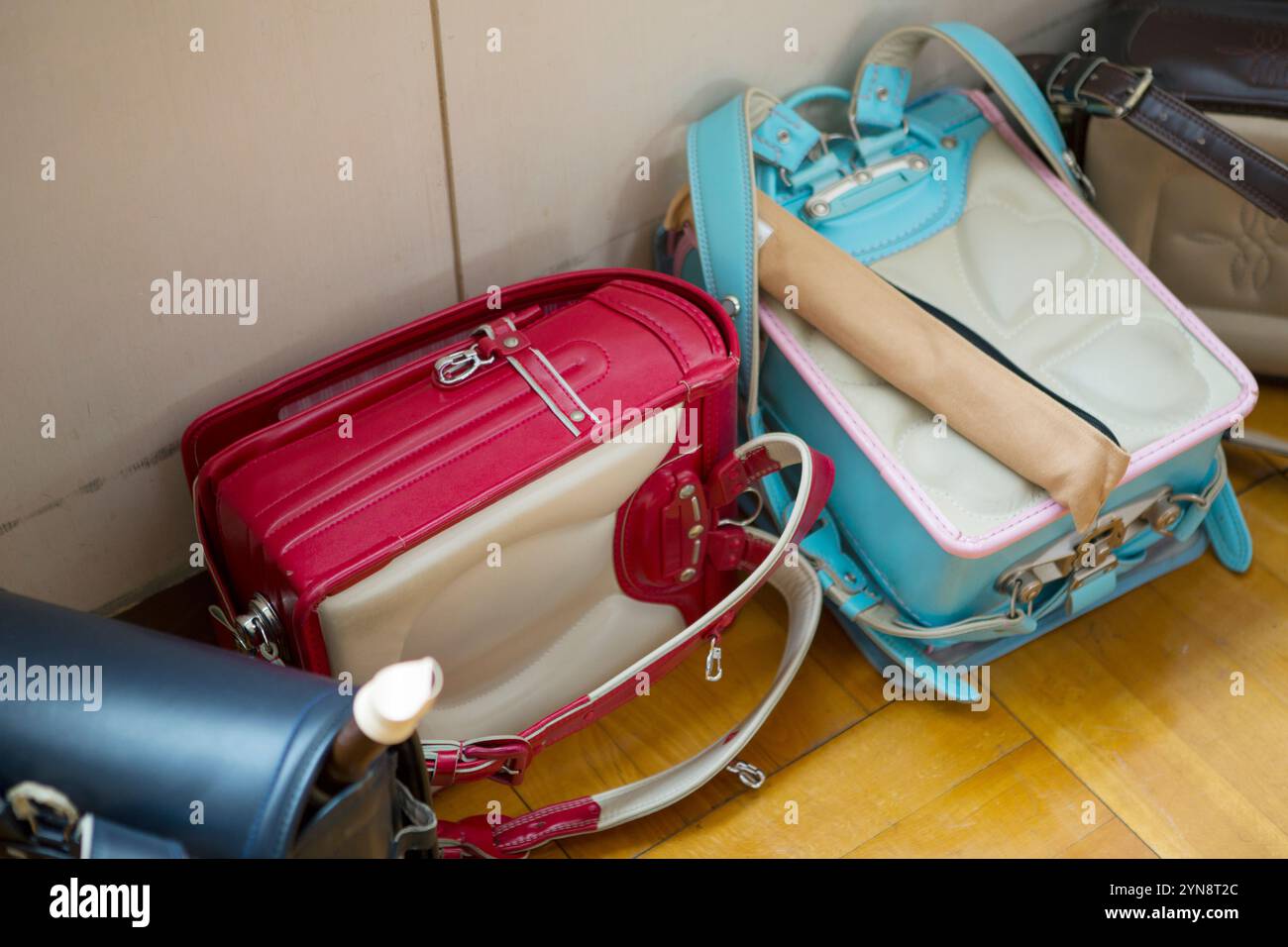 School bags in a classroom Stock Photo - Alamy