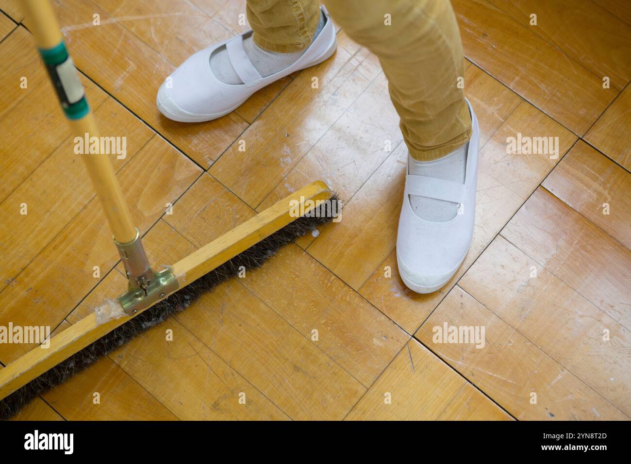 Primary schools students cleaning the classroom Stock Photo - Alamy