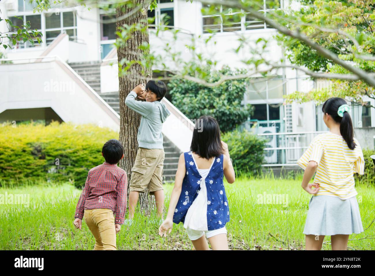Primary schools children, boys and girls, playing outside Stock Photo - Alamy