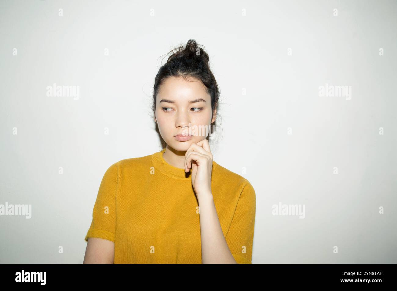 Woman in her 20s making a sulky face Stock Photo - Alamy