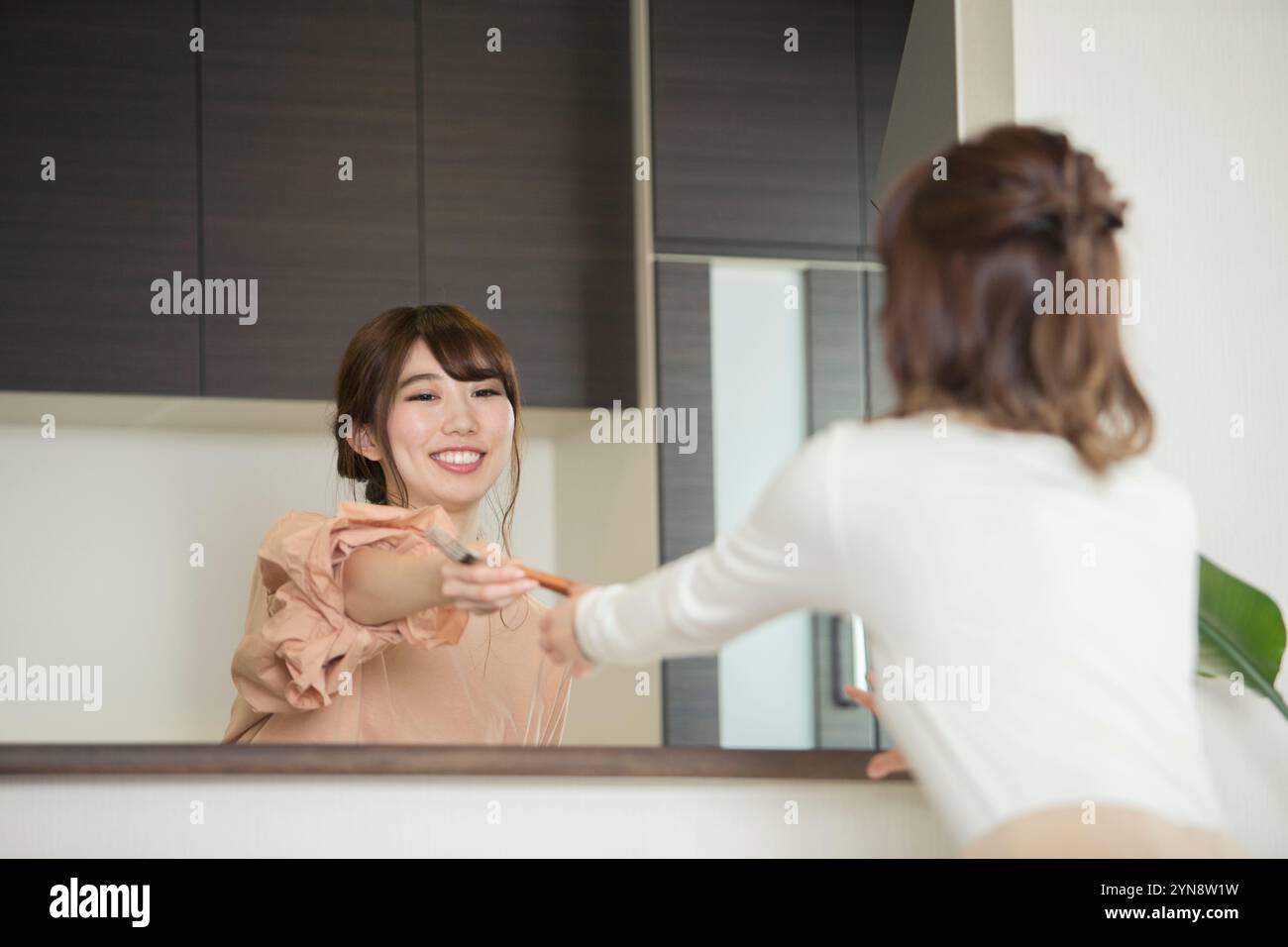 Person back table kitchen hi-res stock photography and images - Alamy