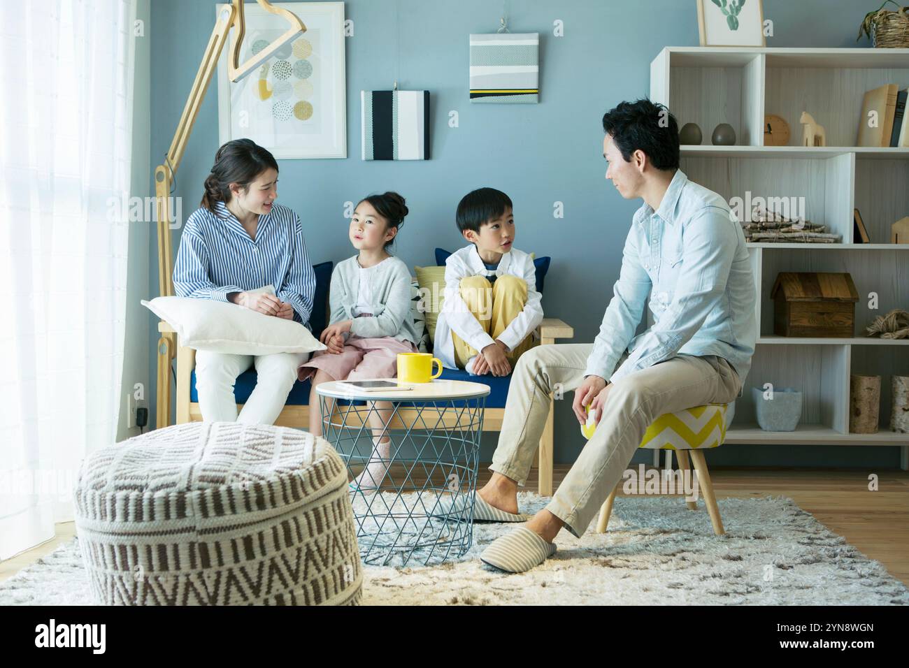 Sister talking to older brother hi-res stock photography and images - Alamy