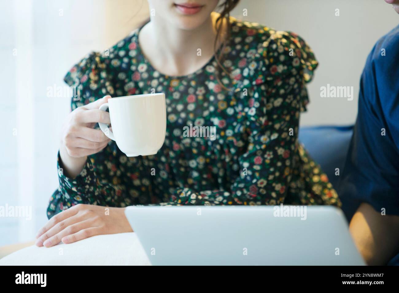 Cup in hand hi-res stock photography and images - Alamy