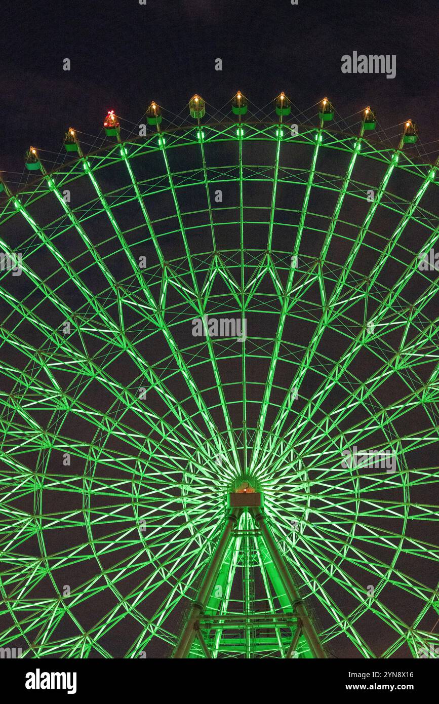 Night View of a Green-Lit Ferris Wheel Stock Photo - Alamy