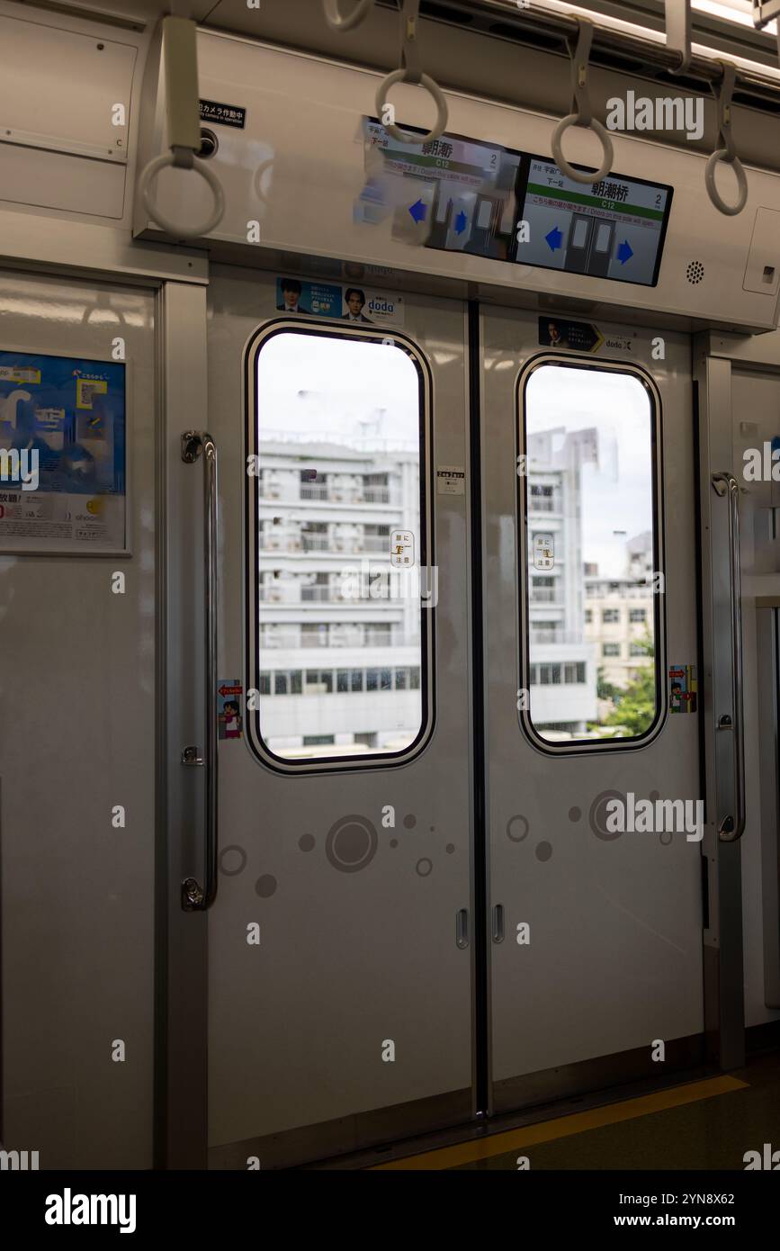 Interior View of Osaka Metro Train Doors Stock Photo - Alamy