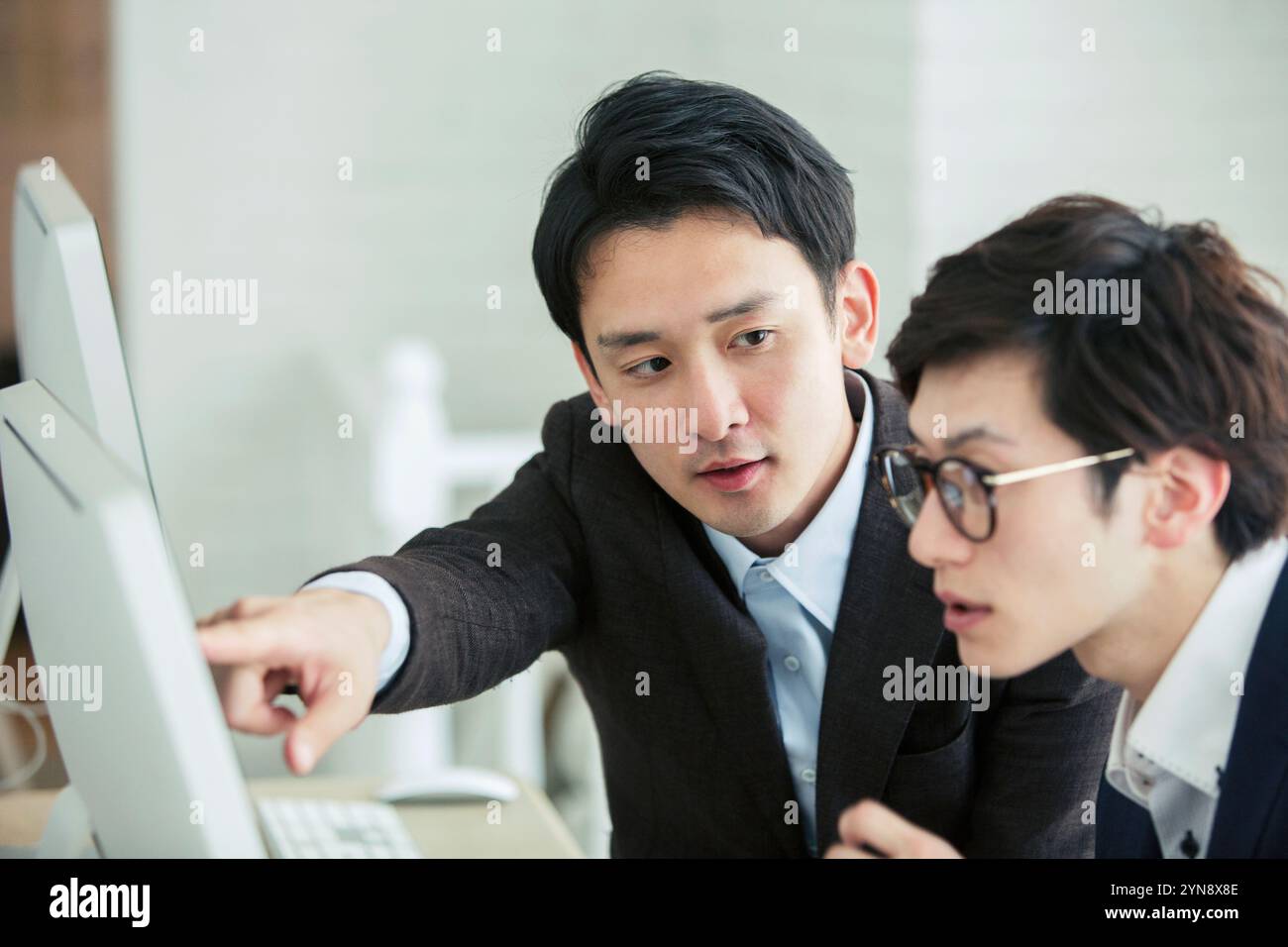 Computer desktop people pointing hi-res stock photography and images ...