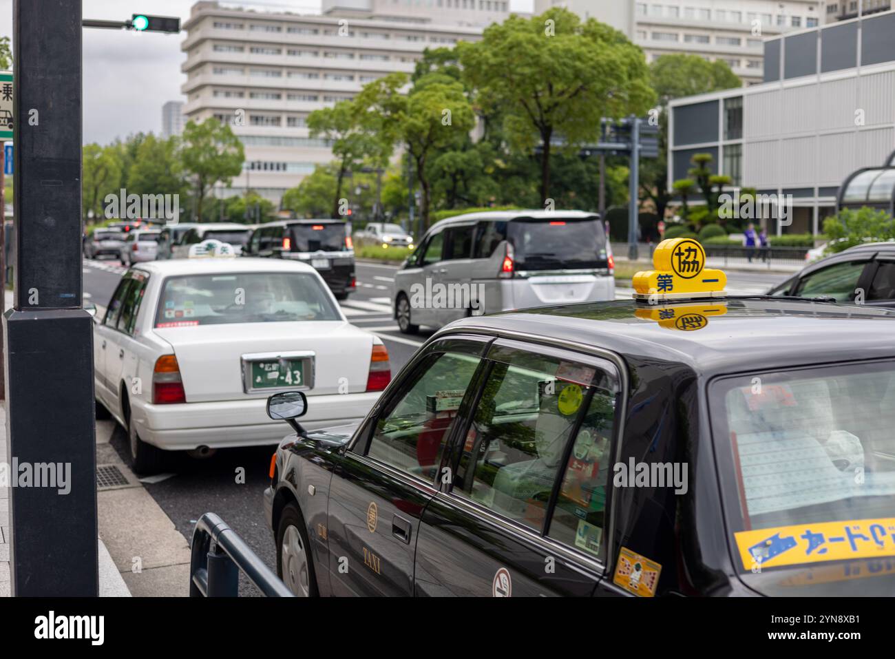 Traffic Scene with Taxis and Cars on a Busy Urban Street Stock Photo ...