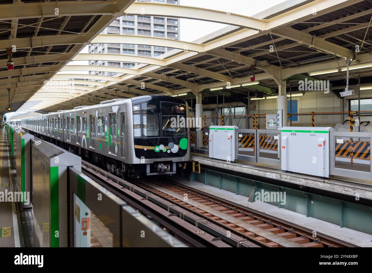 Modern Metro Train at Japanese Urban Station Stock Photo - Alamy
