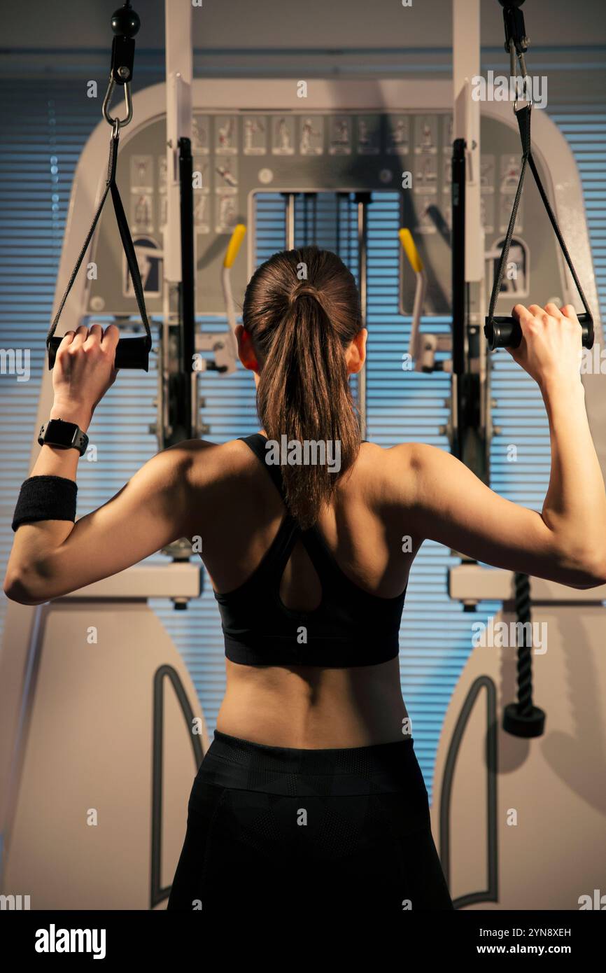 Back view of woman in training Stock Photo - Alamy