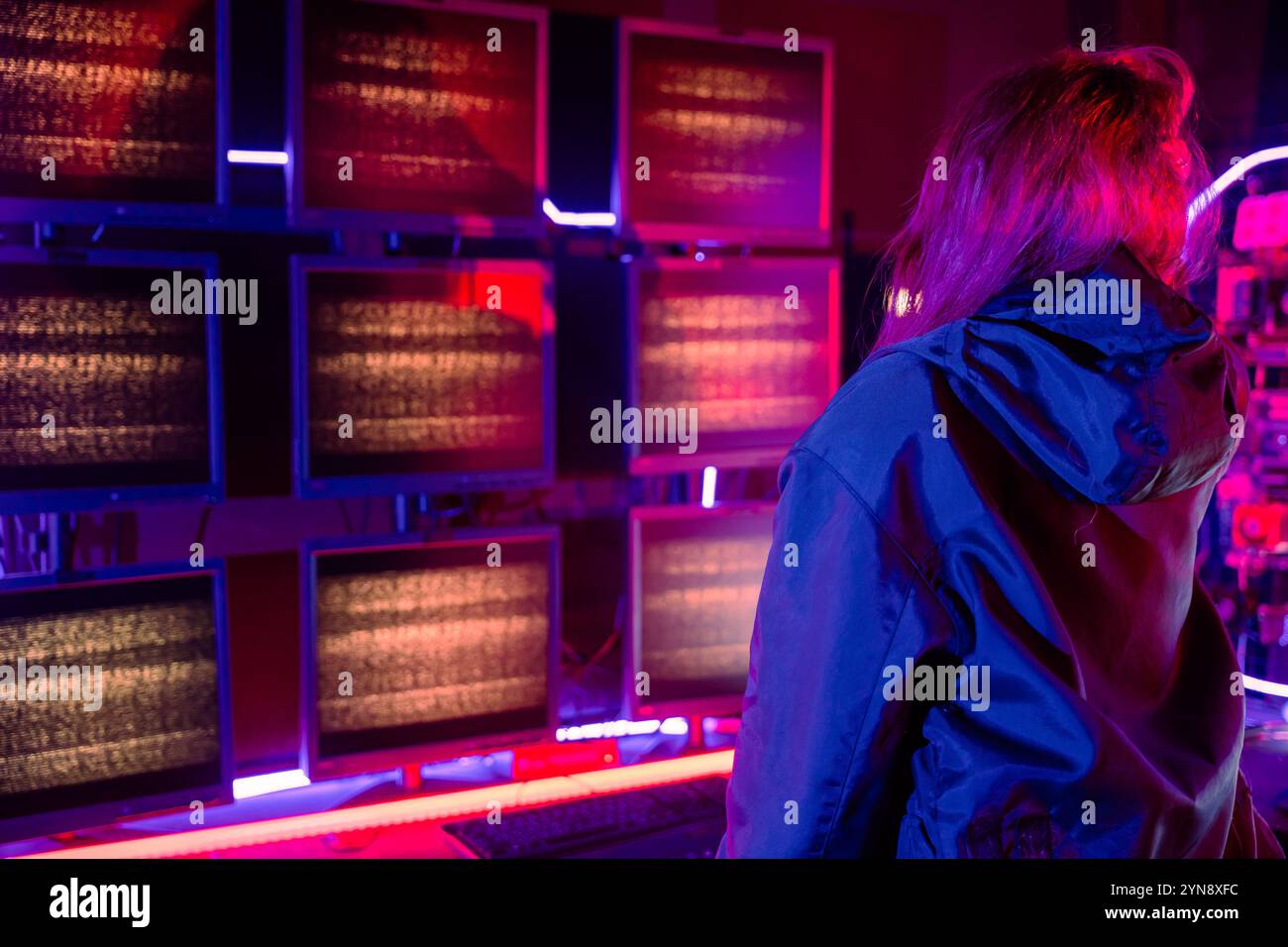 Woman hacker failing. Angry Asian woman wearing a black jacket hacking ...