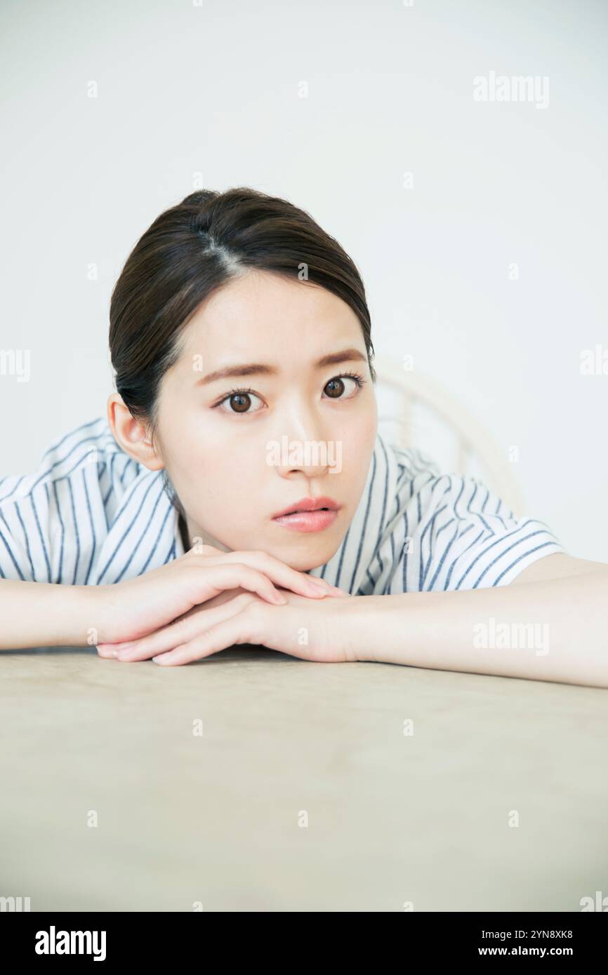 beautiful woman with updo and mirror Stock Photo - Alamy