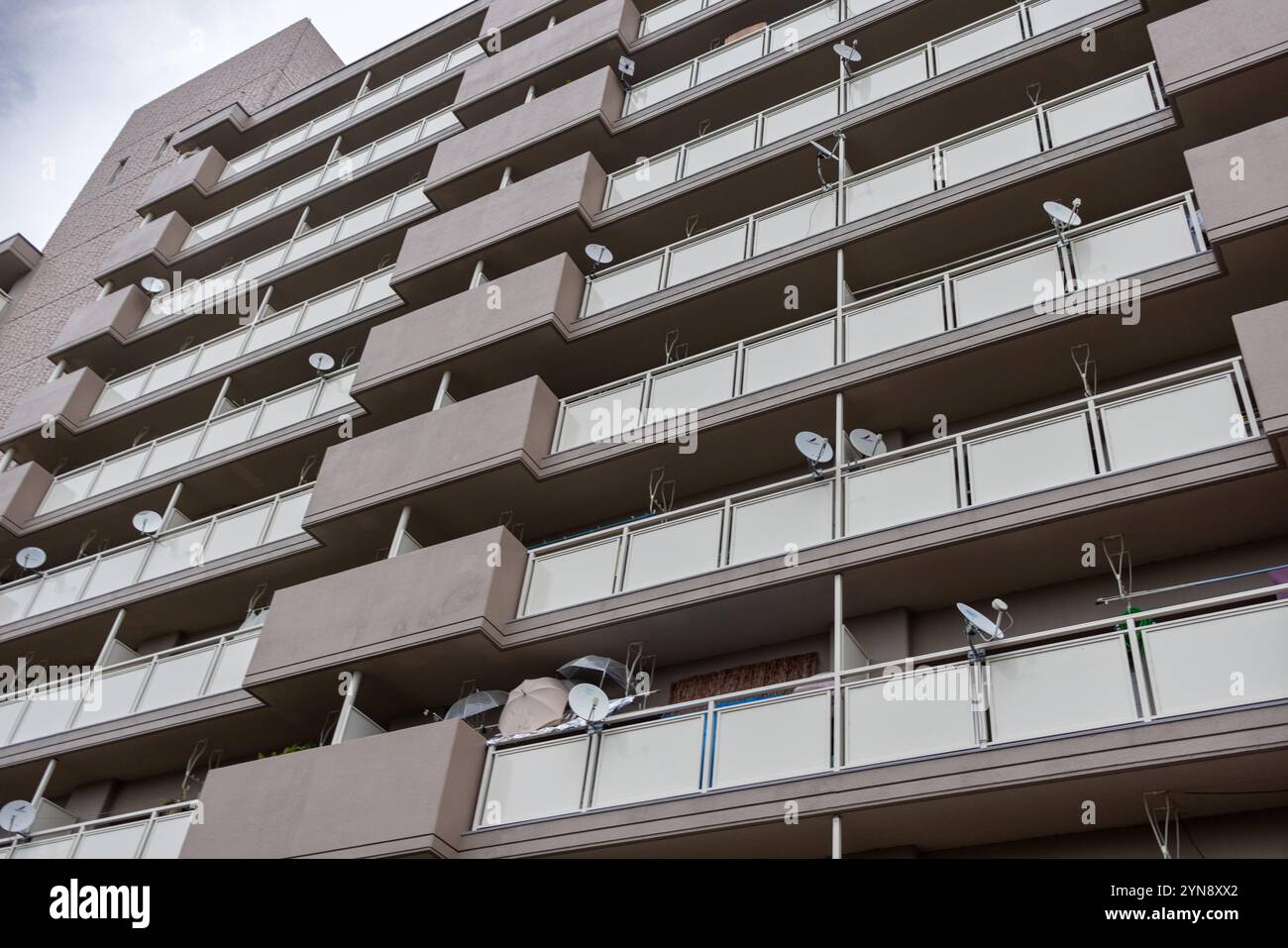 Residential Apartment Building with Satellite Dishes Stock Photo - Alamy