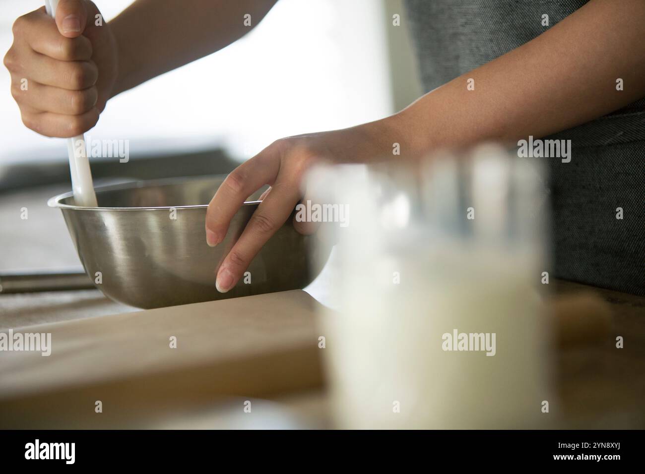 Woman hand stirring bowl hi-res stock photography and images - Alamy