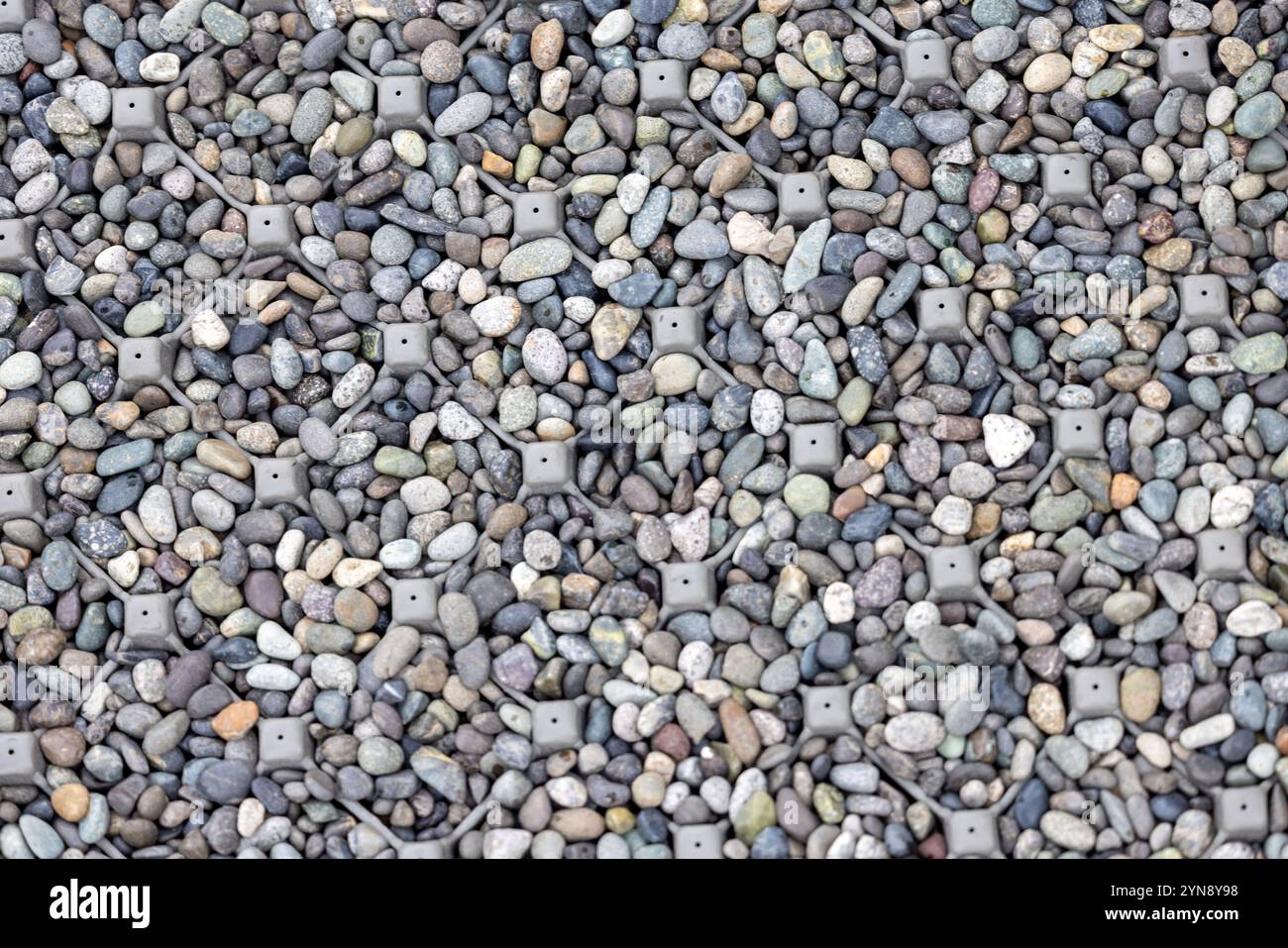 Patterned Gravel Surface with Metal Anchors for Landscape Design Stock ...