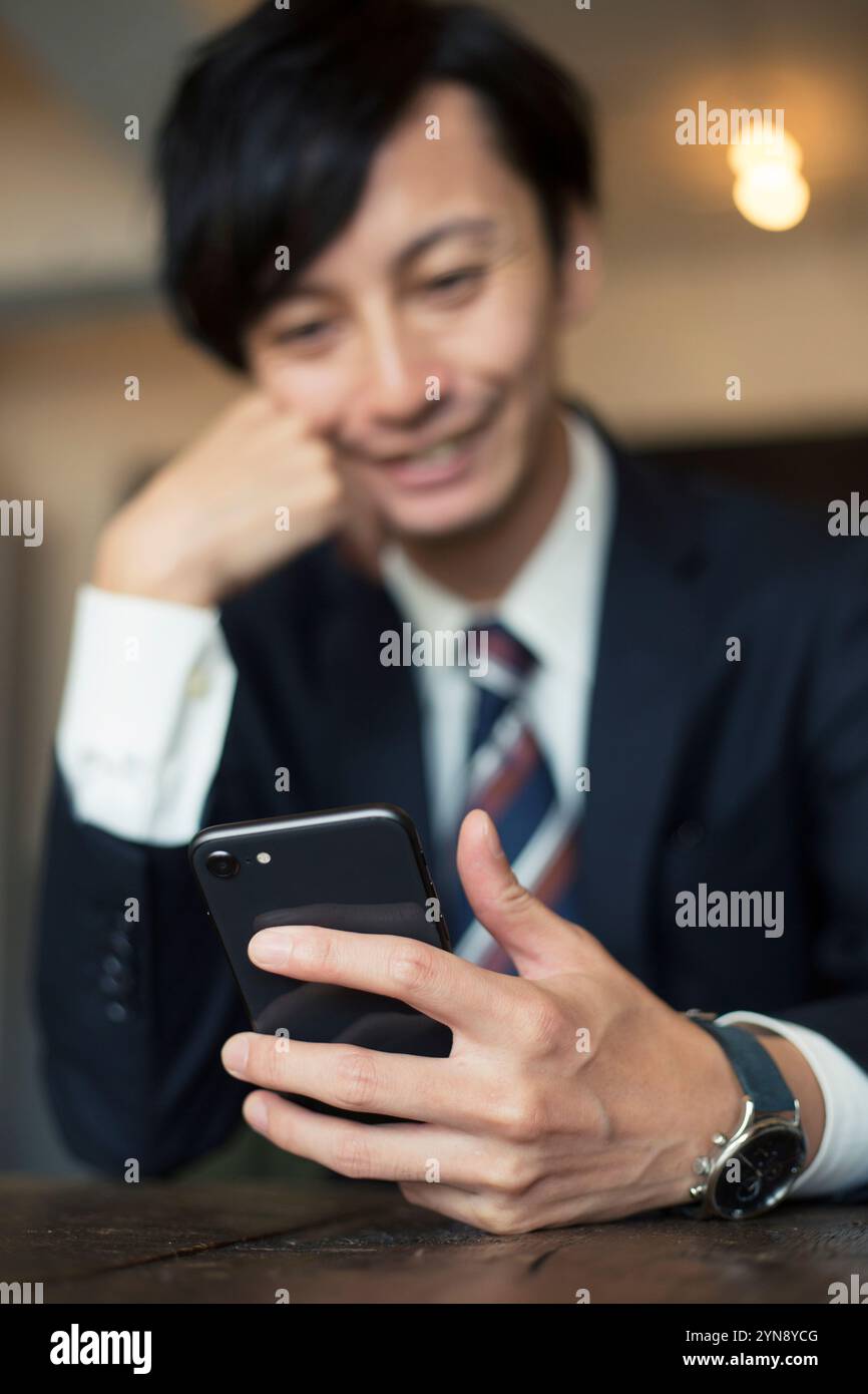 Hands operating smartphone hi-res stock photography and images - Alamy