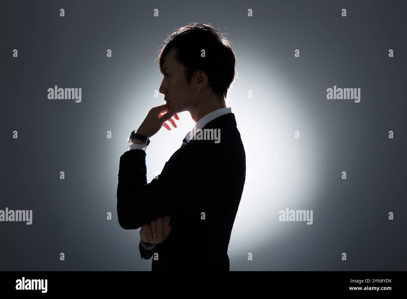 Thinking male profile Stock Photo - Alamy