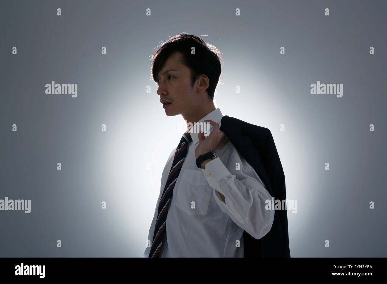 Suit over the shoulder hi-res stock photography and images - Alamy