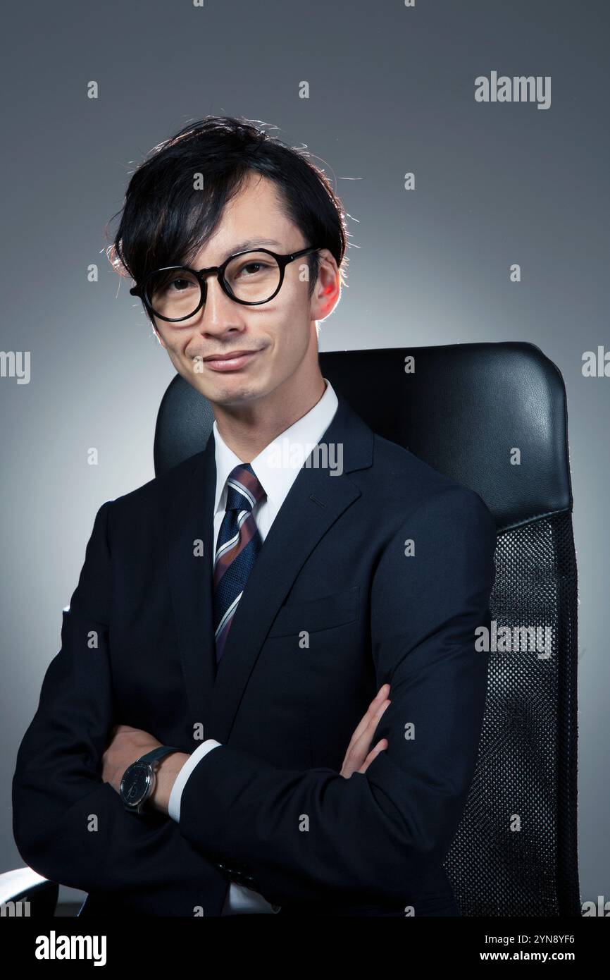 Man folding his arms hi-res stock photography and images - Alamy