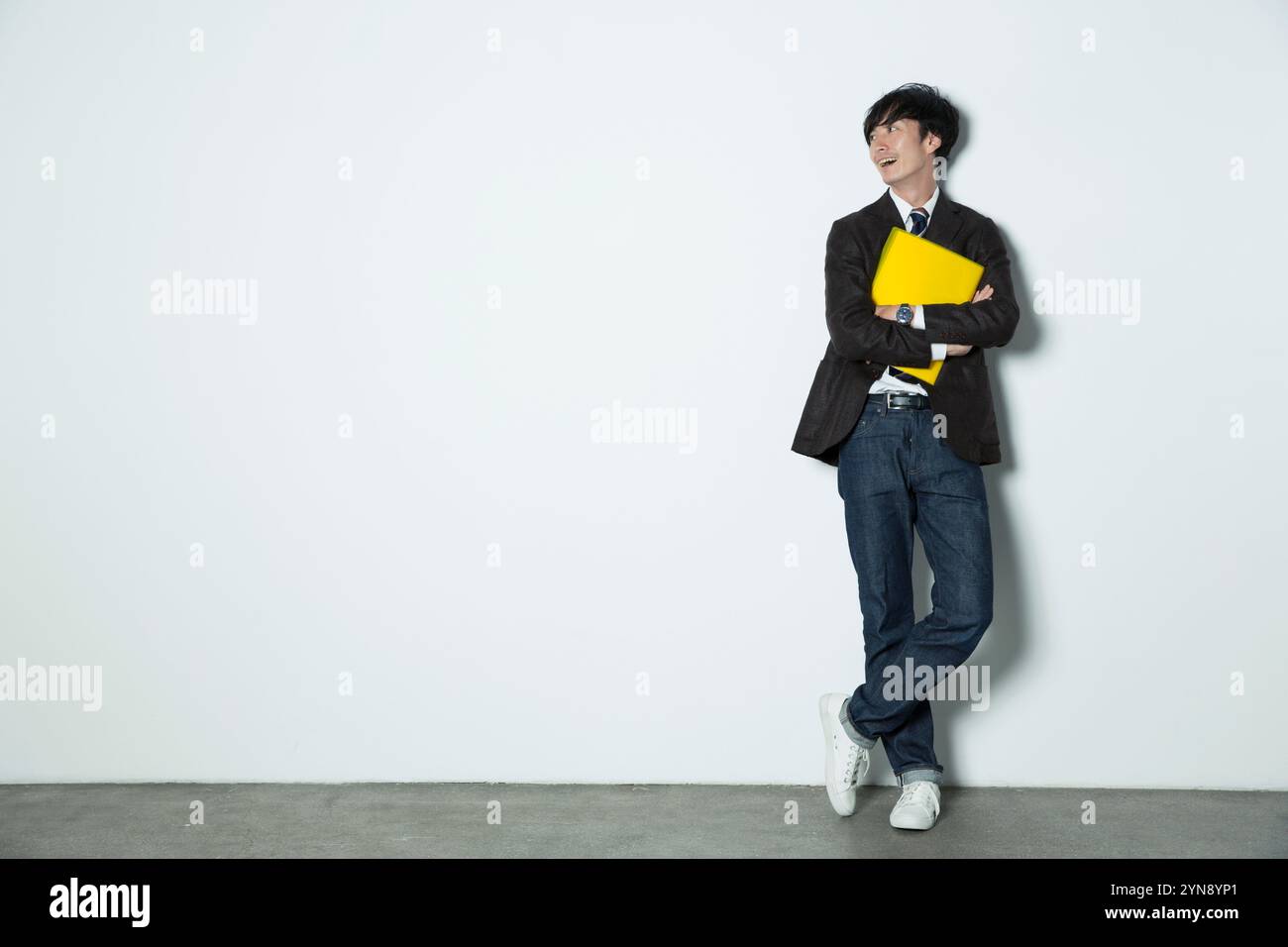 Portrait of man with file Stock Photo - Alamy