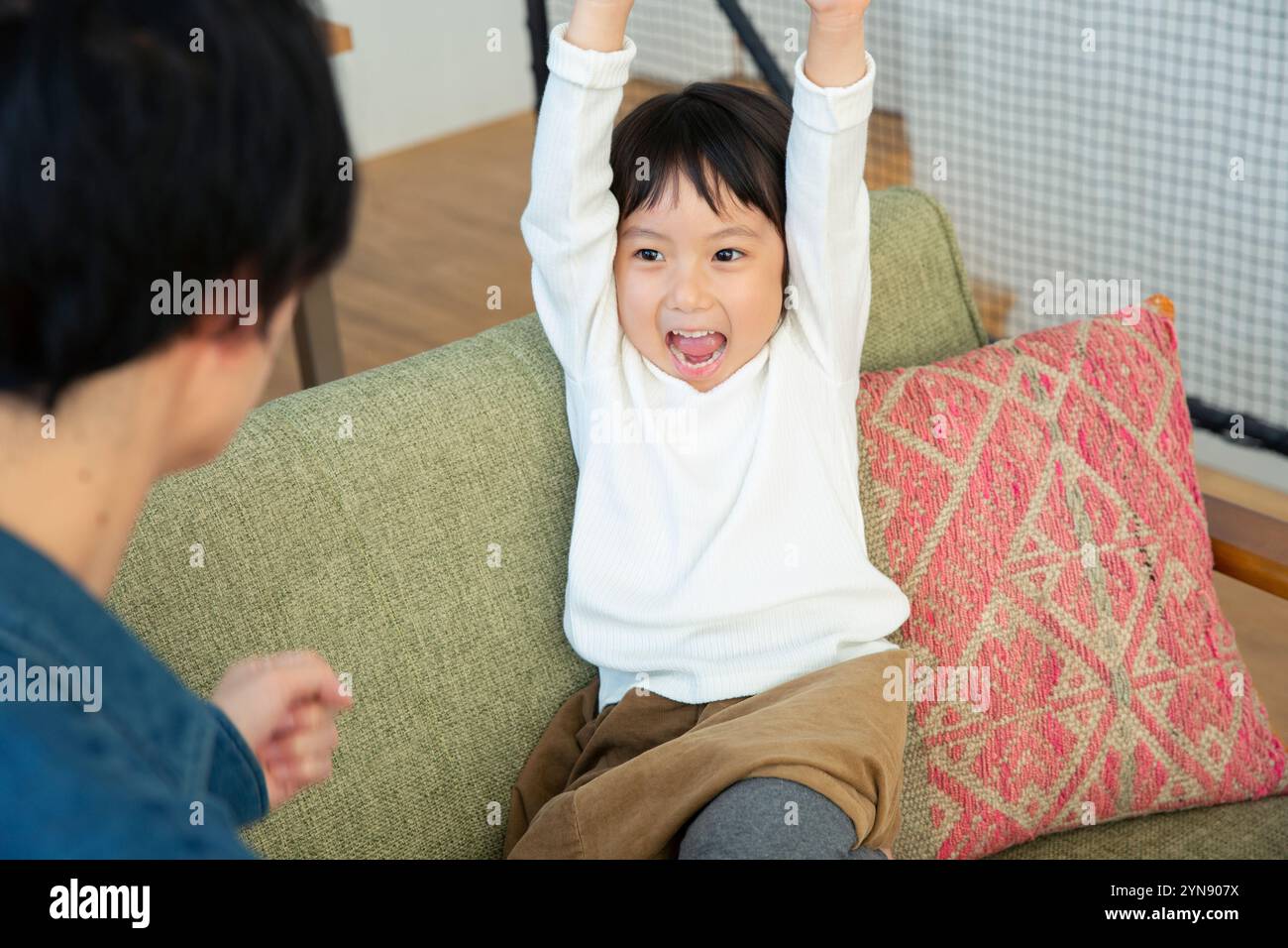 Girl making a hurrah Stock Photo - Alamy