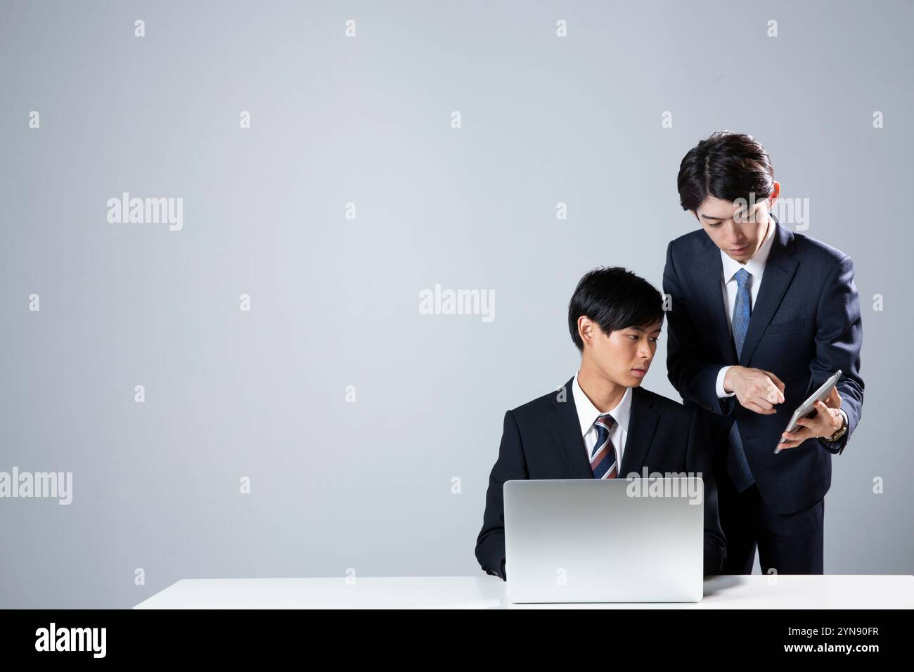Work computer suits hi-res stock photography and images - Alamy
