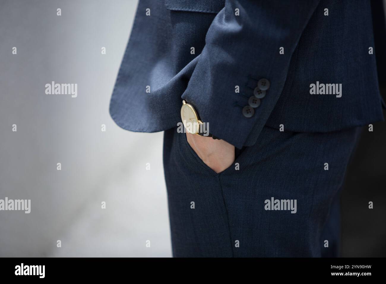 One hand in suit pocket hi-res stock photography and images - Alamy