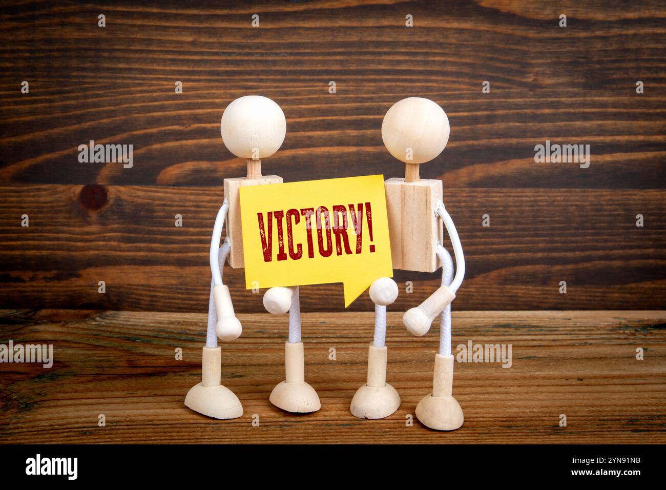 Victory. Speech bubble with text in the hands of a human figures Stock ...